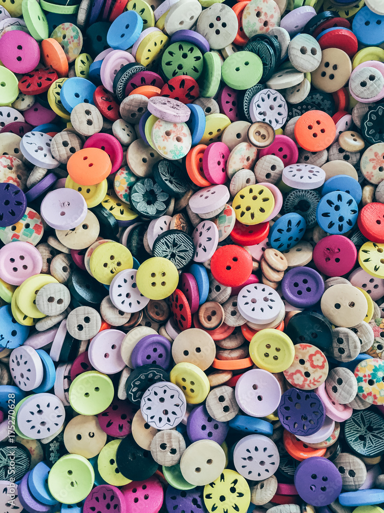 Background or texture of a pile of buttons of many colors Stock Photo ...