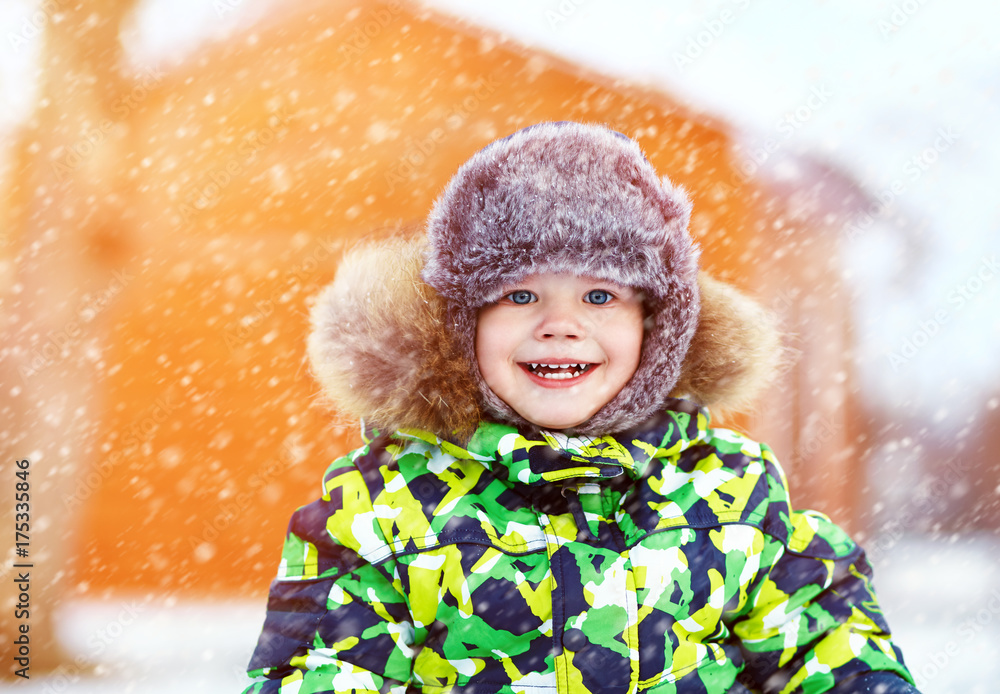 little boy in the winter. child outdoors Stock Photo | Adobe Stock