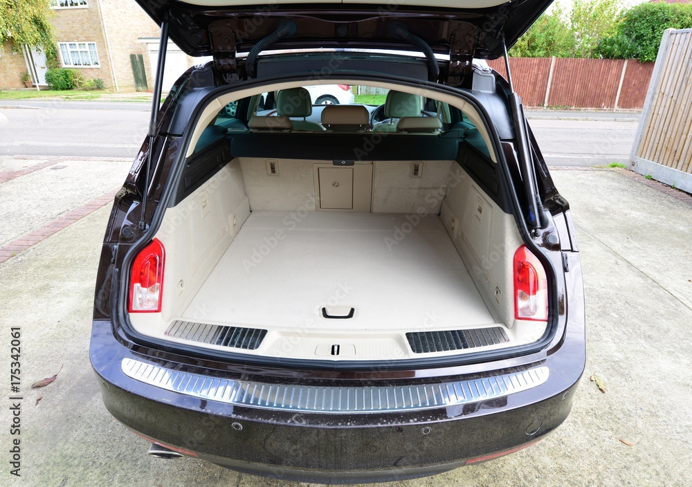 Open tailgate on a luxury estate. Stock Photo | Adobe Stock