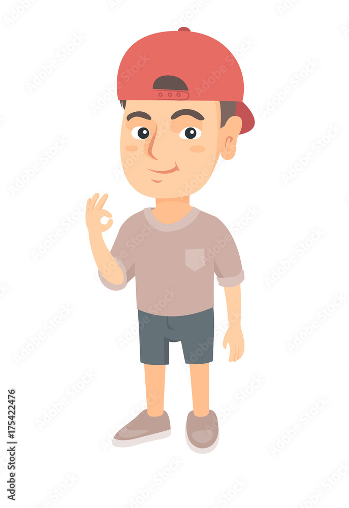Caucasian little smiling boy in a cap showing an ok sign. Happy boy ...