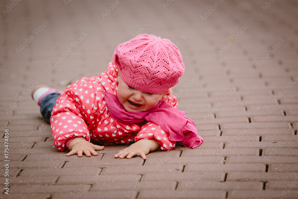 little girl crying after fall, kids safety Stock Photo | Adobe Stock