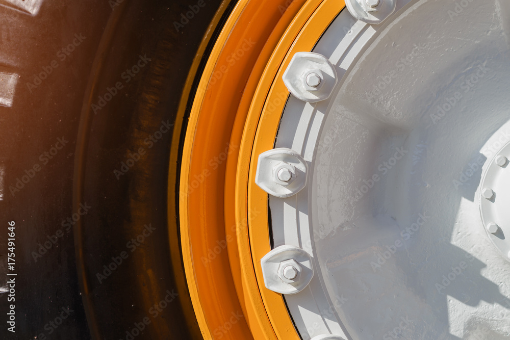 Part of the wheel of a large heavy dump truck for working on a coal ...