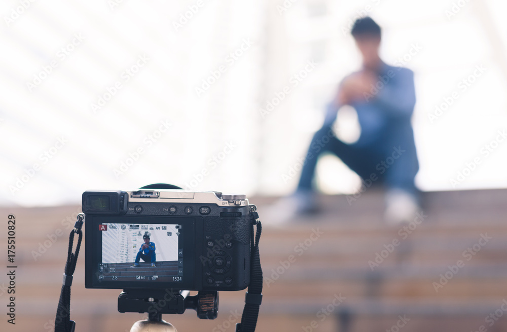 live view on camera screen with handsome guy taking photo him self ...