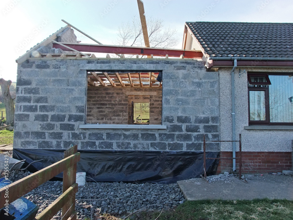 Building an Extension on to a bungalow house home Stock Photo | Adobe Stock
