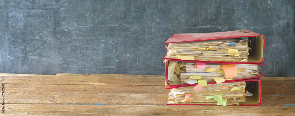 messy file folders, on grungy background,panoramic, good copy space ...