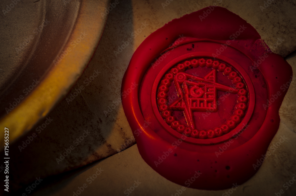 Freemason secret symbol concept with vintage letter under a candle ...