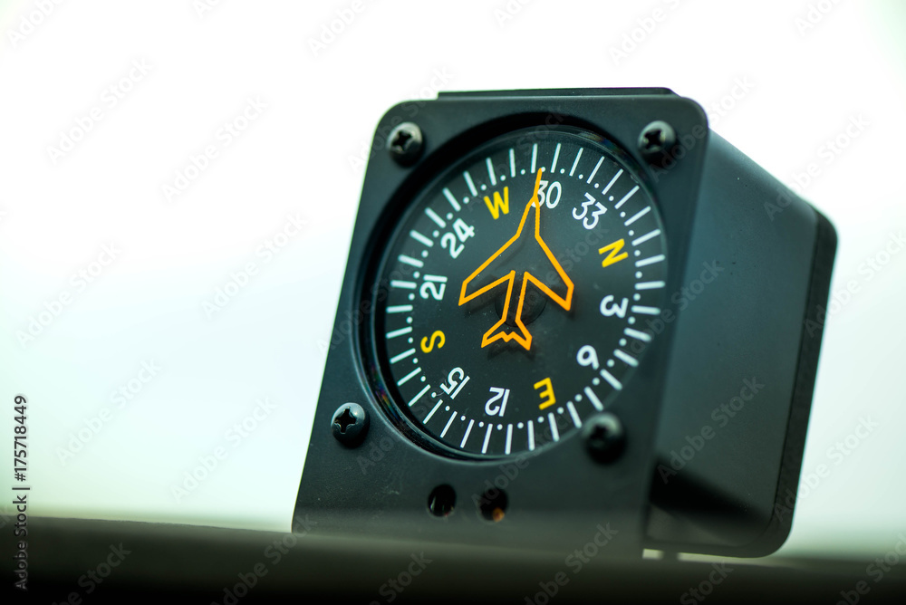 Macro shot of compass. Aircraft equipment, various indicators, buttons ...