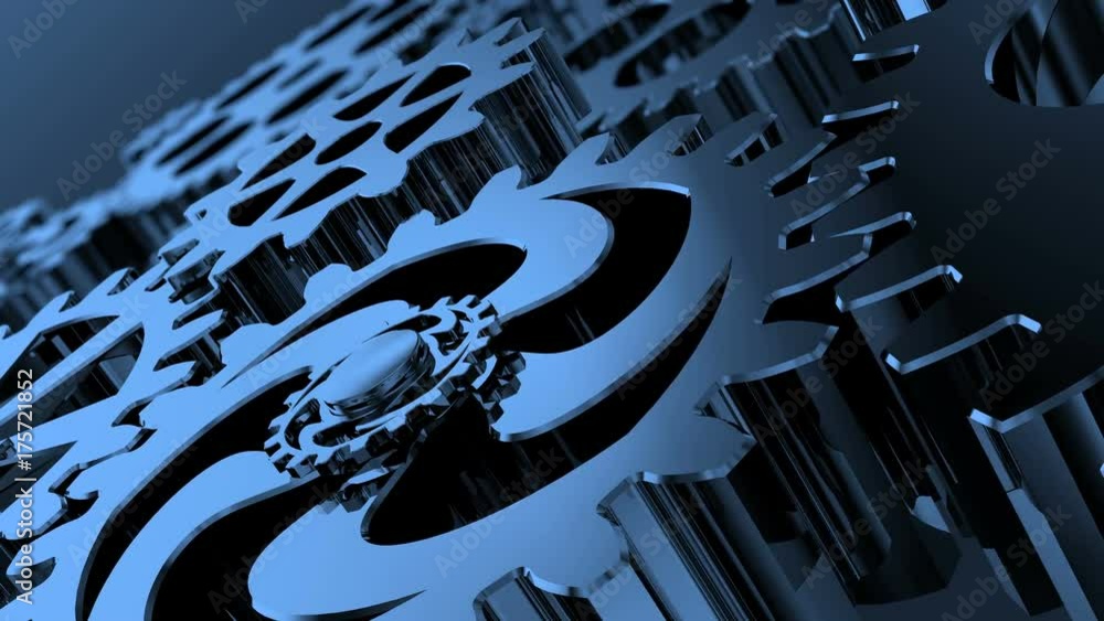 Isolated rotating blue gears. Movement of metal gears in a mechanical ...