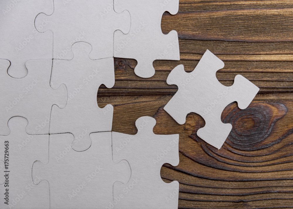 Hand with missing jigsaw puzzle piece. Business concept image for ...