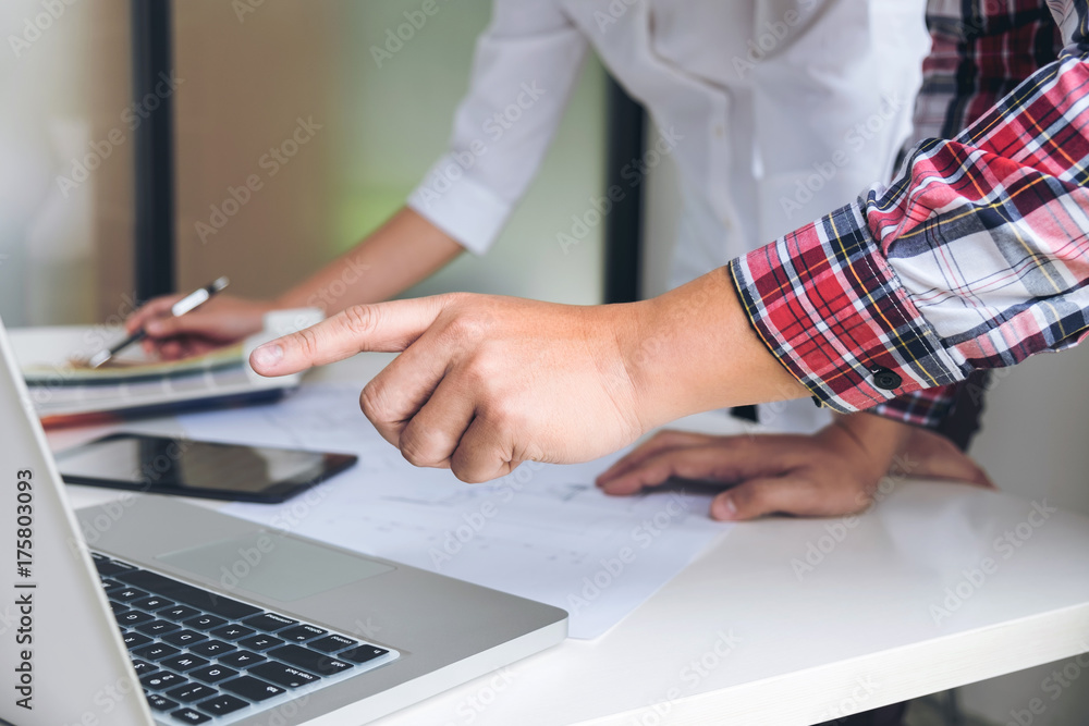 Two interior design or graphic designer at work on project of ...