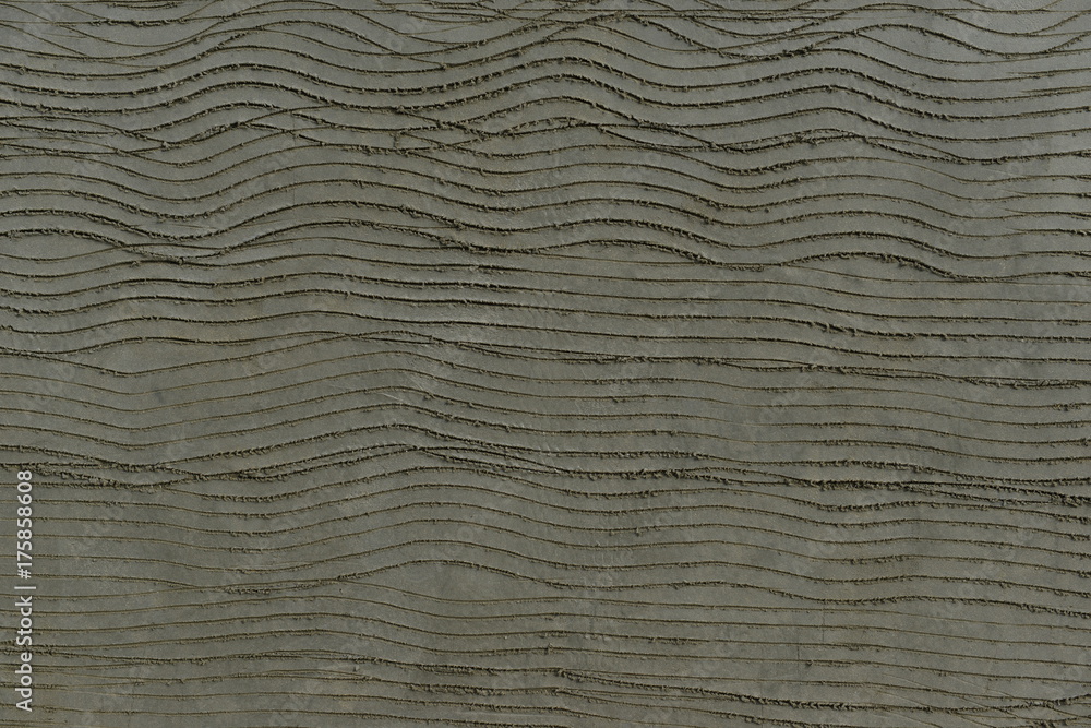 Rendered cement plaster, U.K. Freshly scratch coated wall by a ...