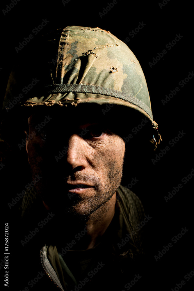 Half face portrait of combat stressed US Marine (Vietnam War) with face ...