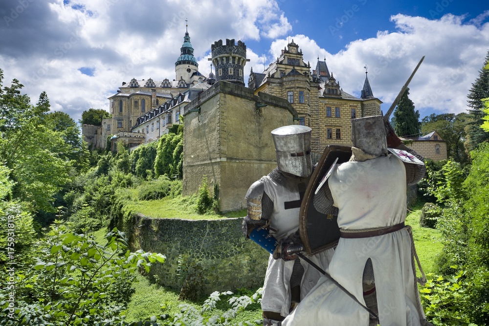 Medieval fighting knights in front of Gothic and Renaissance style ...
