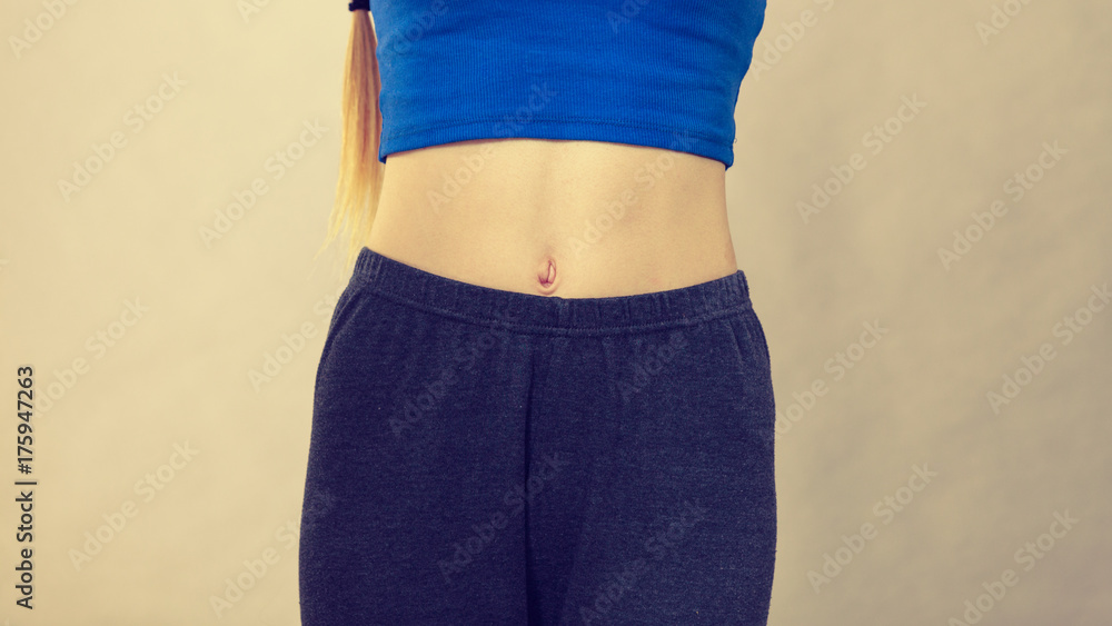 Woman outfit showing belly Stock Photo | Adobe Stock