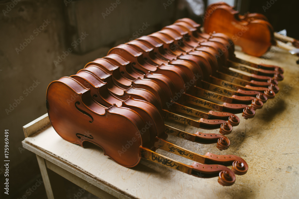 Unfinished violins without strings in a workshop Stock-Foto | Adobe Stock