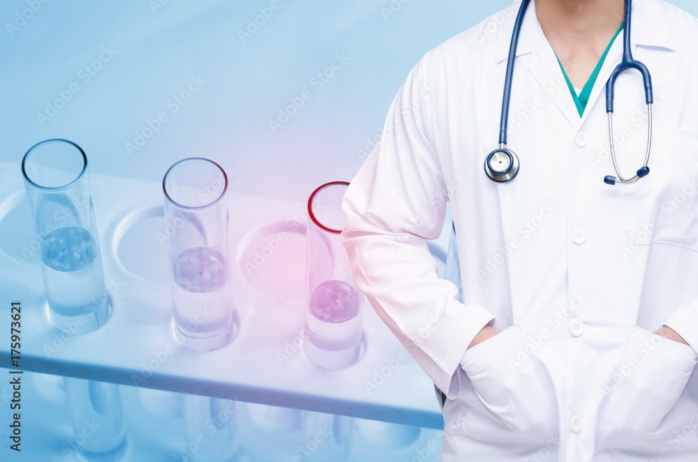 smart doctor with a stethoscope and close up chemical liquid in ...