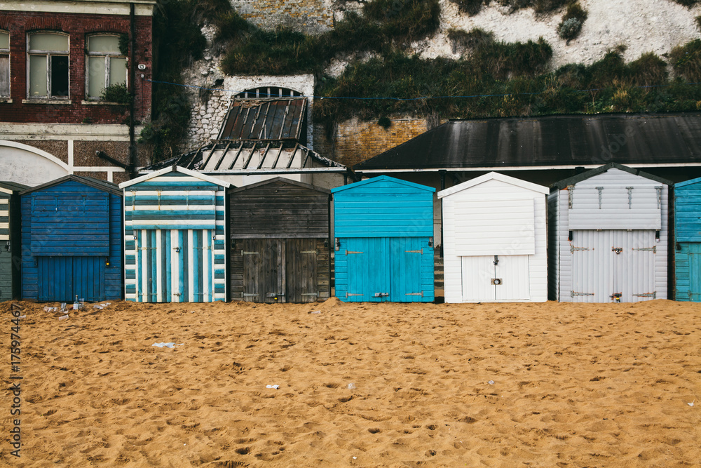Beach huts on the beach in a typical English seaside resort. Stock ...