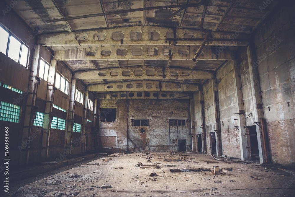 Abandoned industrial warehouse on ruined brick factory, creepy interior ...