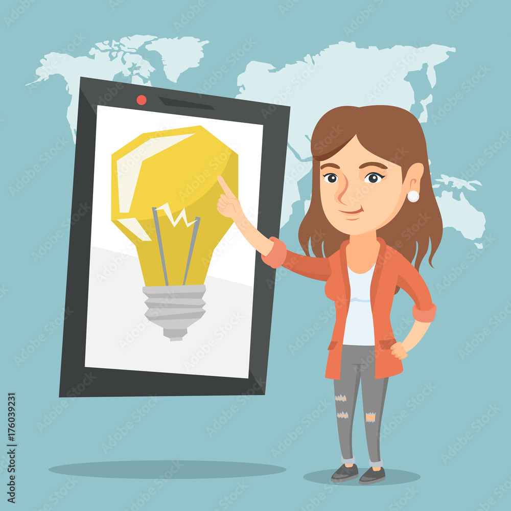 Caucasian woman pointing at a big tablet computer with a light bulb on ...