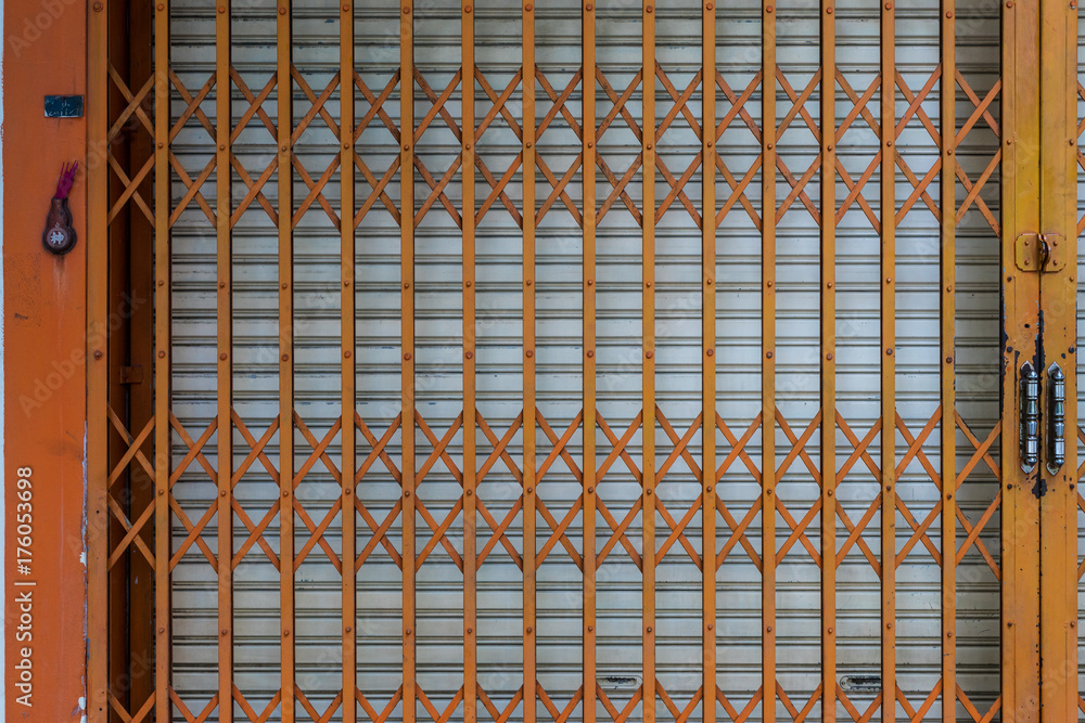 Orange folding metal door gate Thai vintage style. Pattern, texture ...