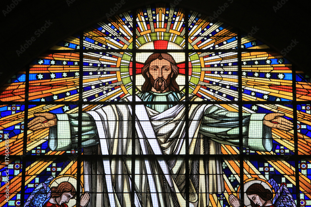 Stained glass window of Christ welcoming a soldier. Window in the upper ...