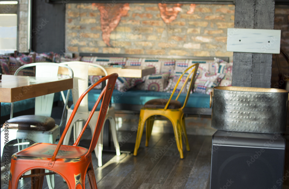 Interior of a modern urban cafe in the morning sunlight. Beautiful ...