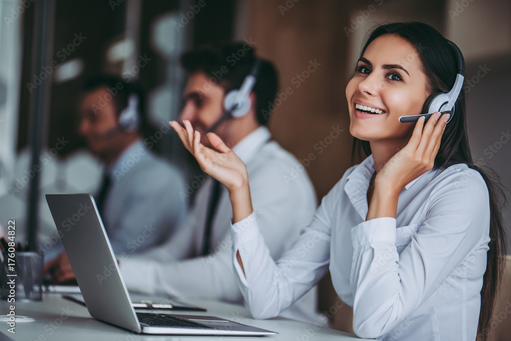Call center workers Stock Photo | Adobe Stock