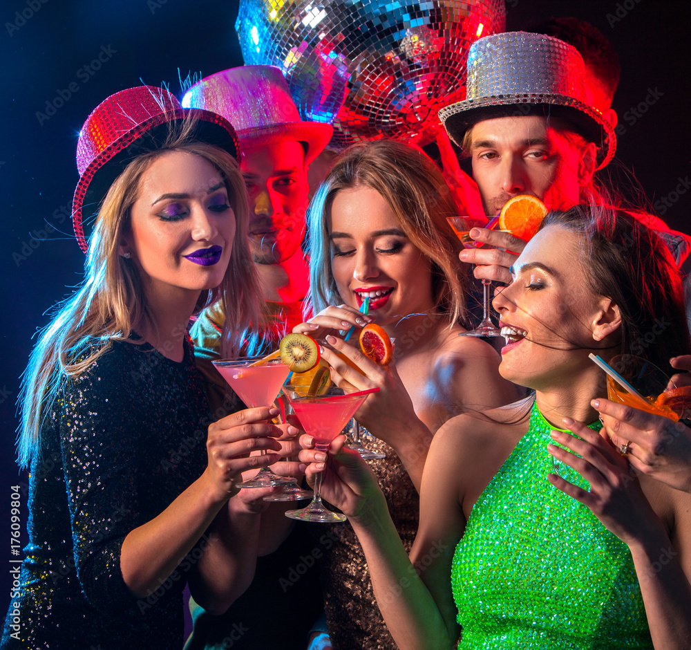 Cocktail party with group people dancing and drink cocktail. Happy ...