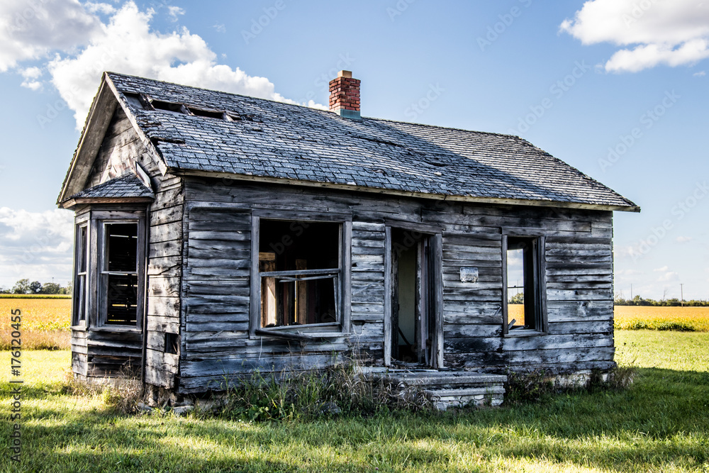 old abandoned small house on field Stock Photo | Adobe Stock