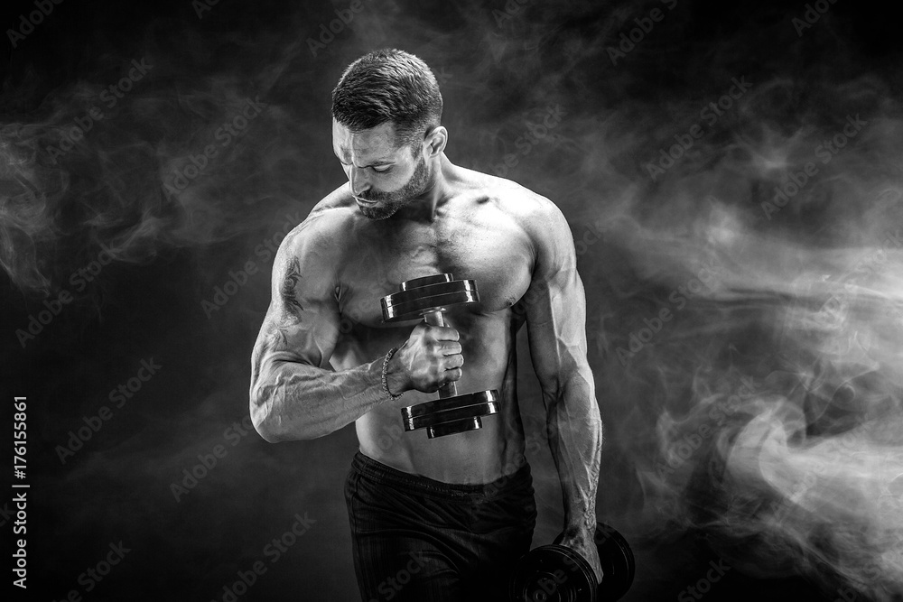 Young ripped man bodybuilder with perfect abs, shoulders,biceps ...