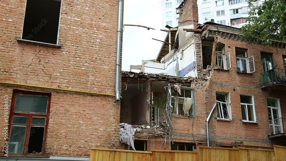 Destruction of the house from gas explosion. Ruins of building after ...