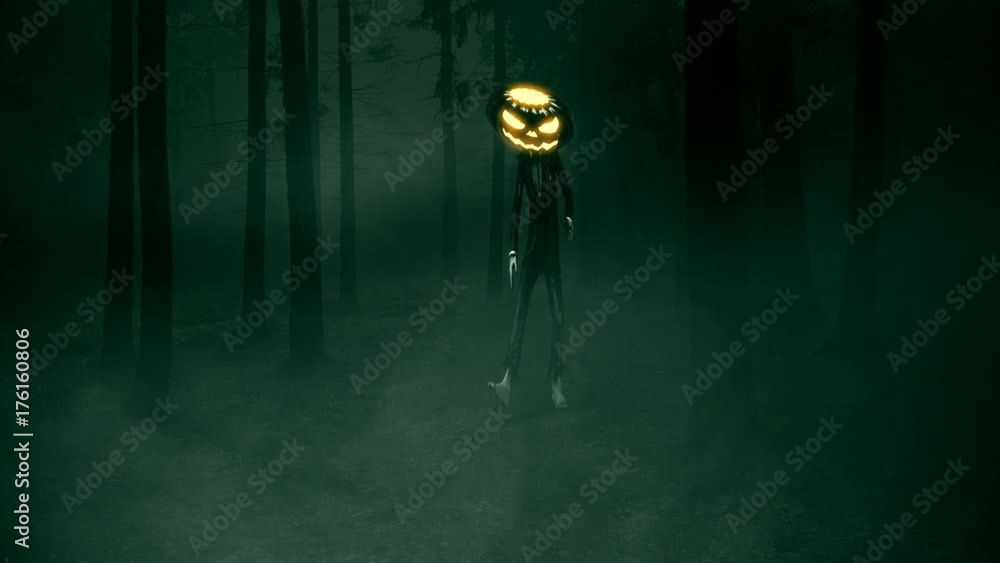 Terrifying Jack O Lantern / Pumpkin Man walking in a foggy forest at ...