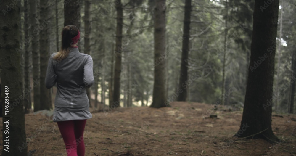 Girl Running Through Forest