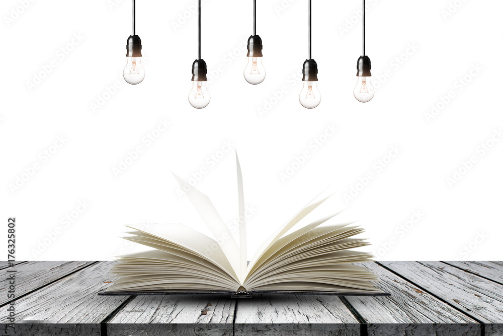 Vintage open book and light bulbs Stock Photo | Adobe Stock