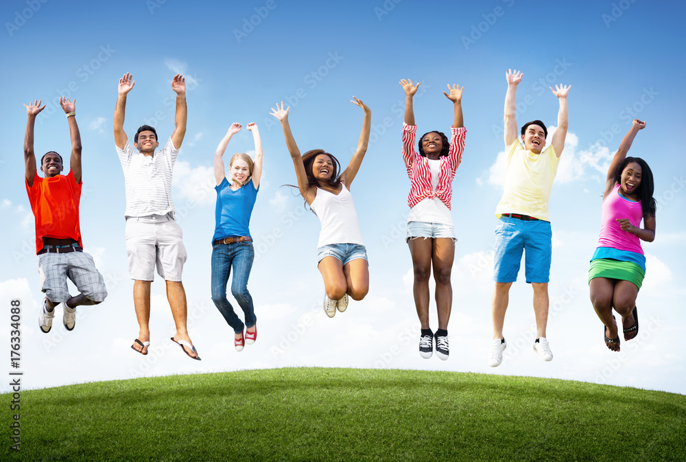 Happy diverse young people jumping Stock Photo | Adobe Stock