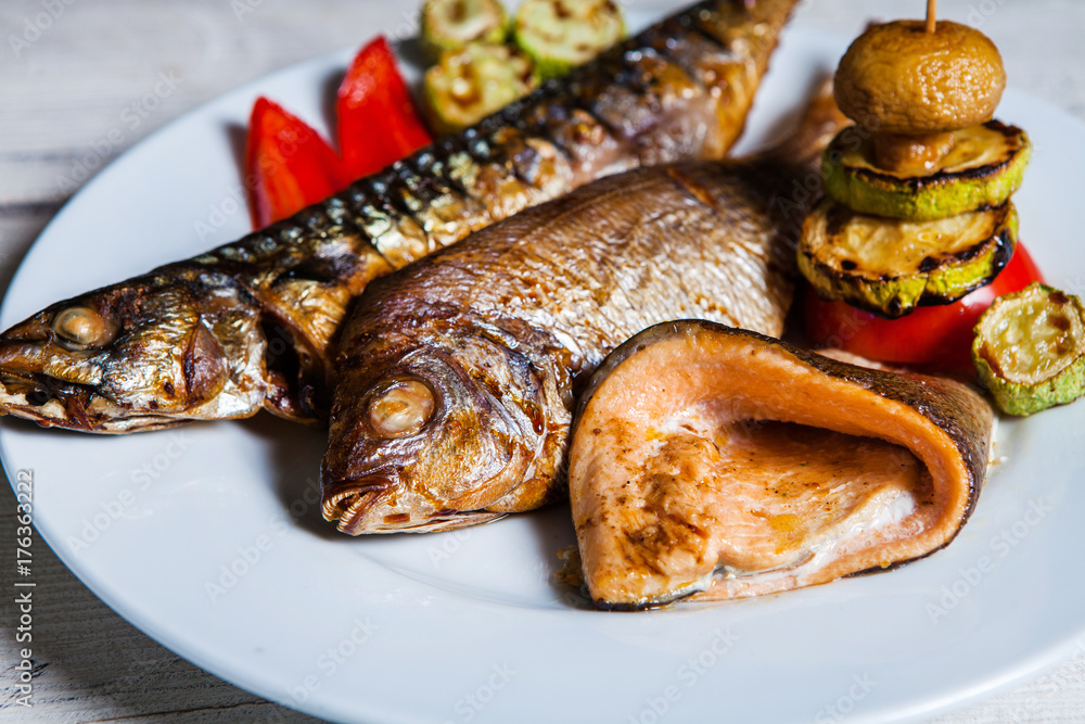 Assortment of fried fasting fish, Mackerel, trout, carp. Top view on ...