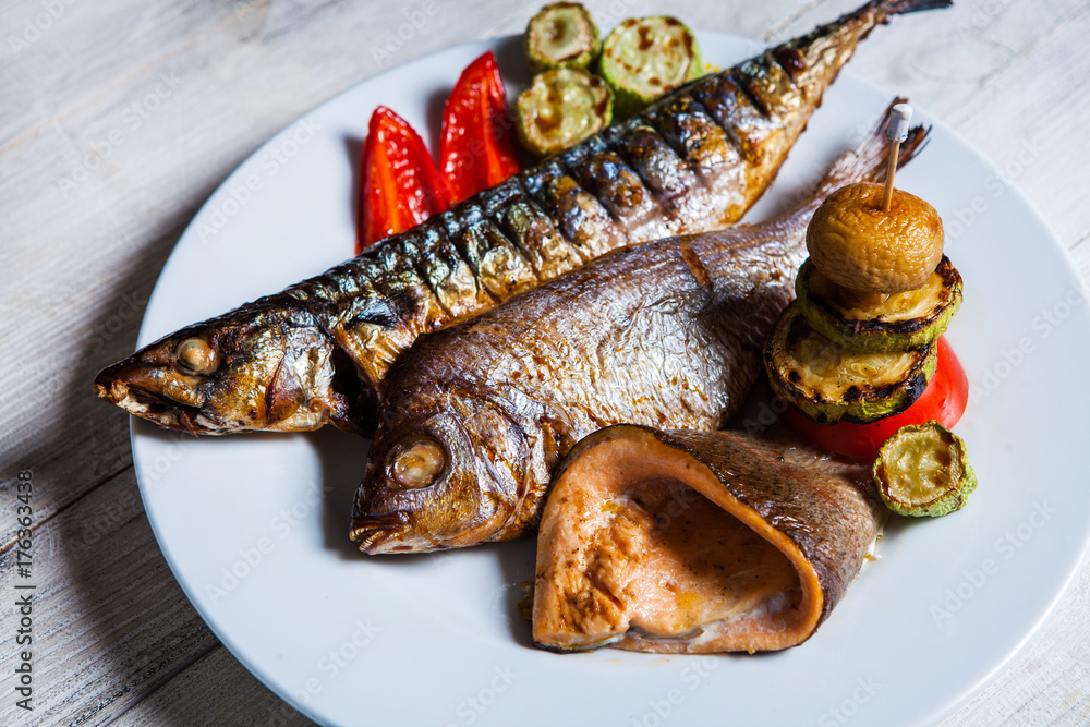 Assortment of fried fasting fish, Mackerel, trout, carp. Top view on ...