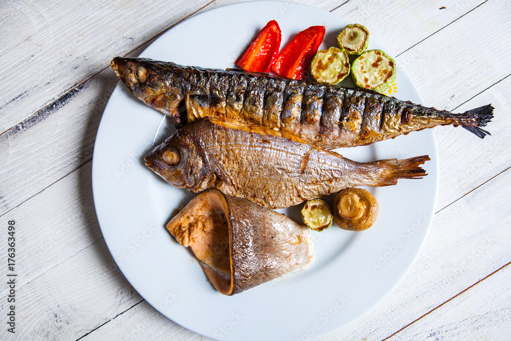 Assortment of fried fasting fish, Mackerel, trout, carp. Top view on ...