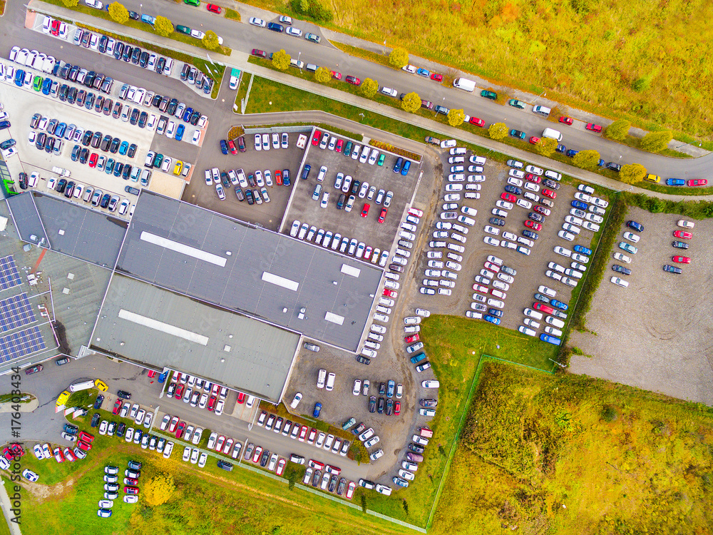 Aerial view of parking lot with cars. Industrial background on ...