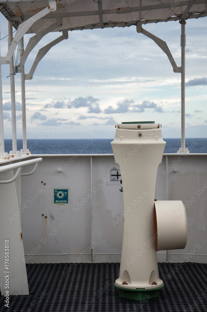 Gyro compass on the navigational bridge wing. Stock Photo | Adobe Stock