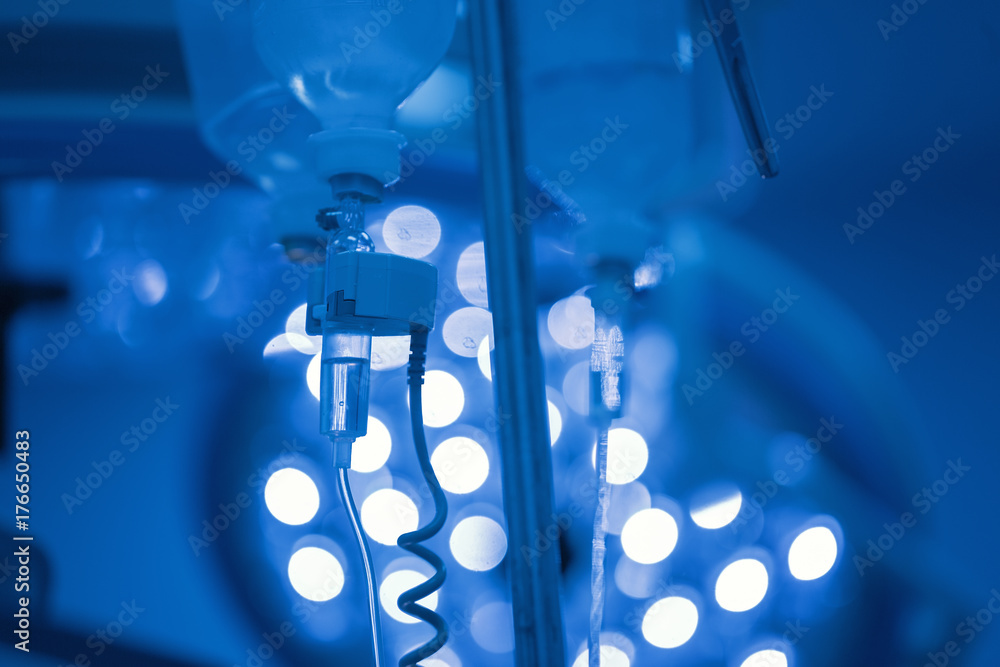 perfusion drip equipment hanging in hospital medical unit, blue ...