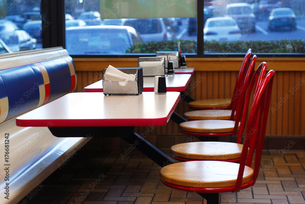 Table and seats inside fast food restaurant Stock Photo | Adobe Stock