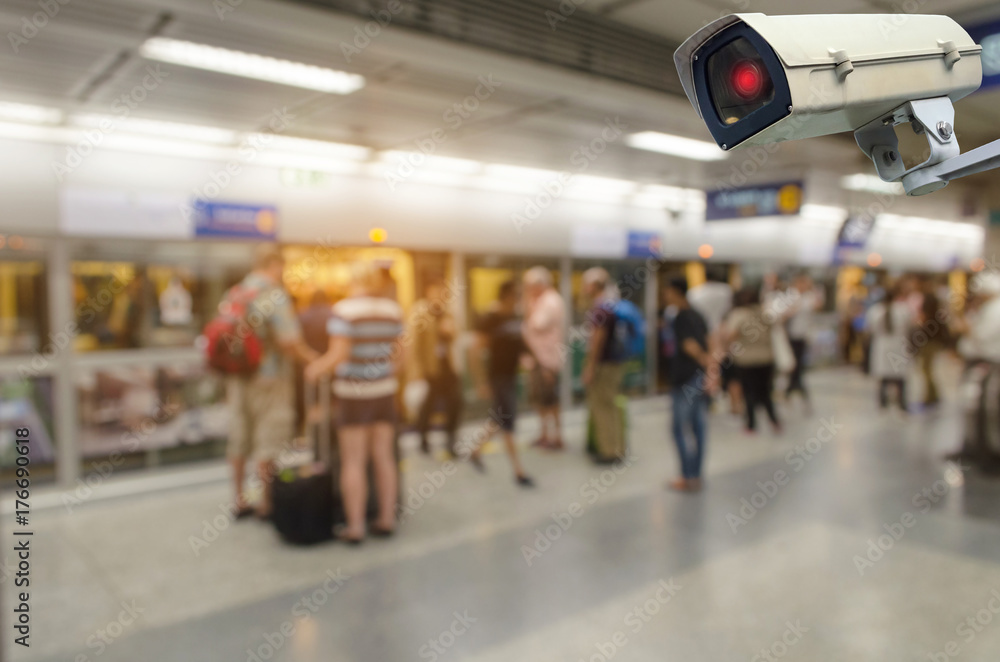 CCTV, security camera system operating with people waiting subway at ...