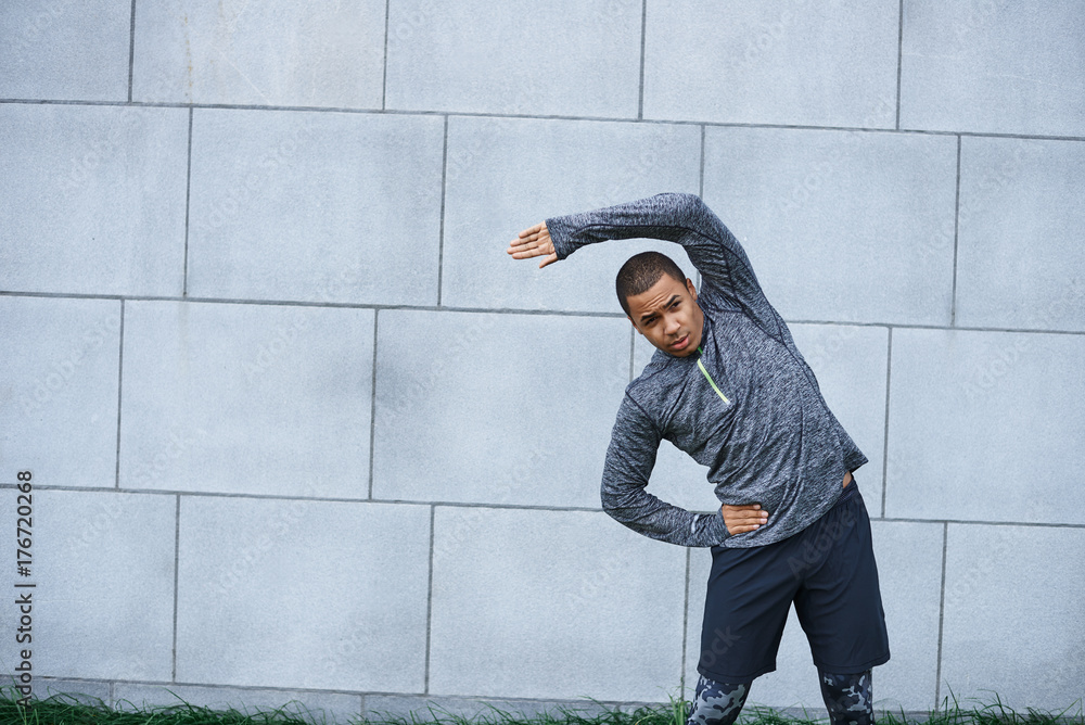 Sports, activity, health and fitness concept. Fit young African male ...