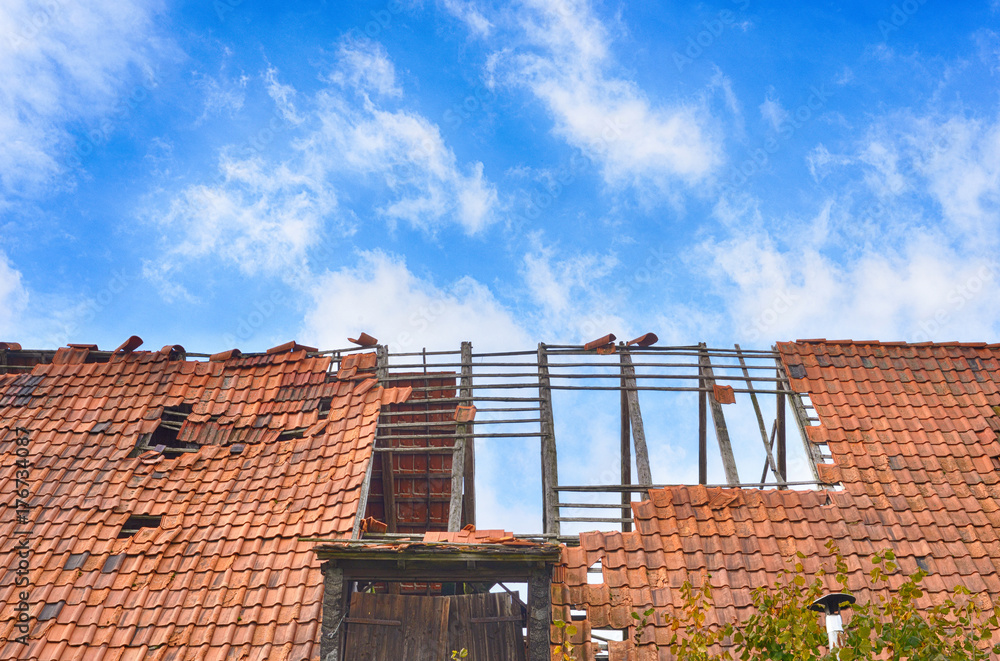 House roof after a storm with destroyed roof bricks and structure Stock ...