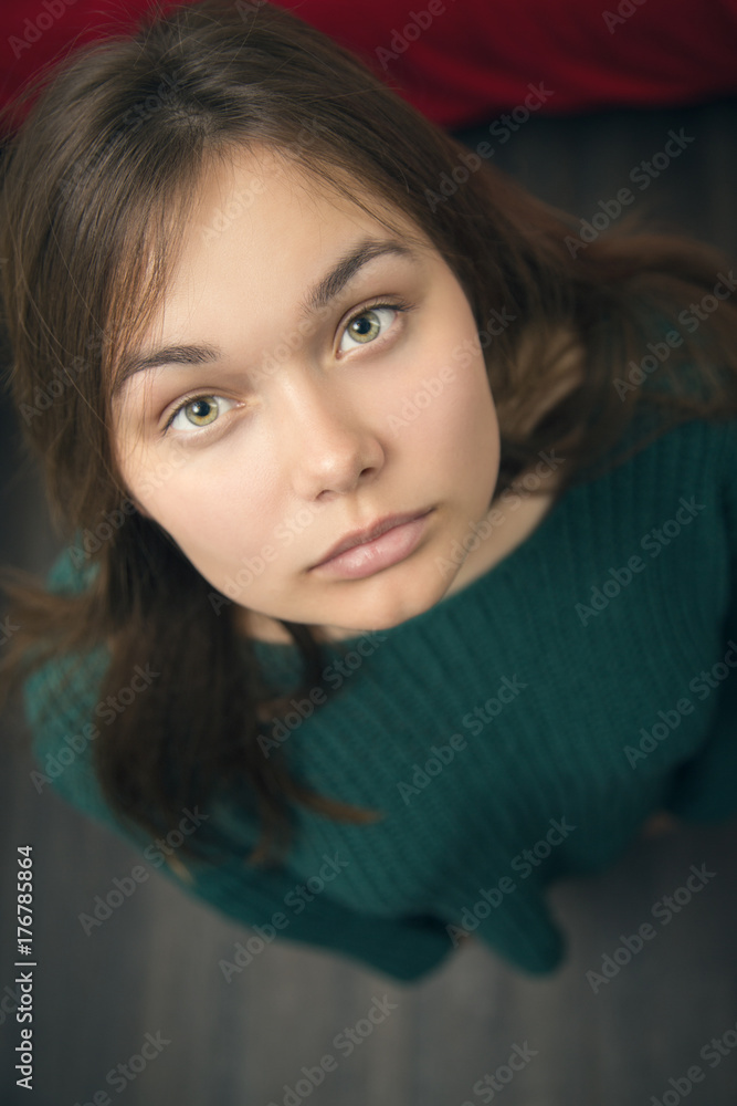 Woman Looking Up At Camera