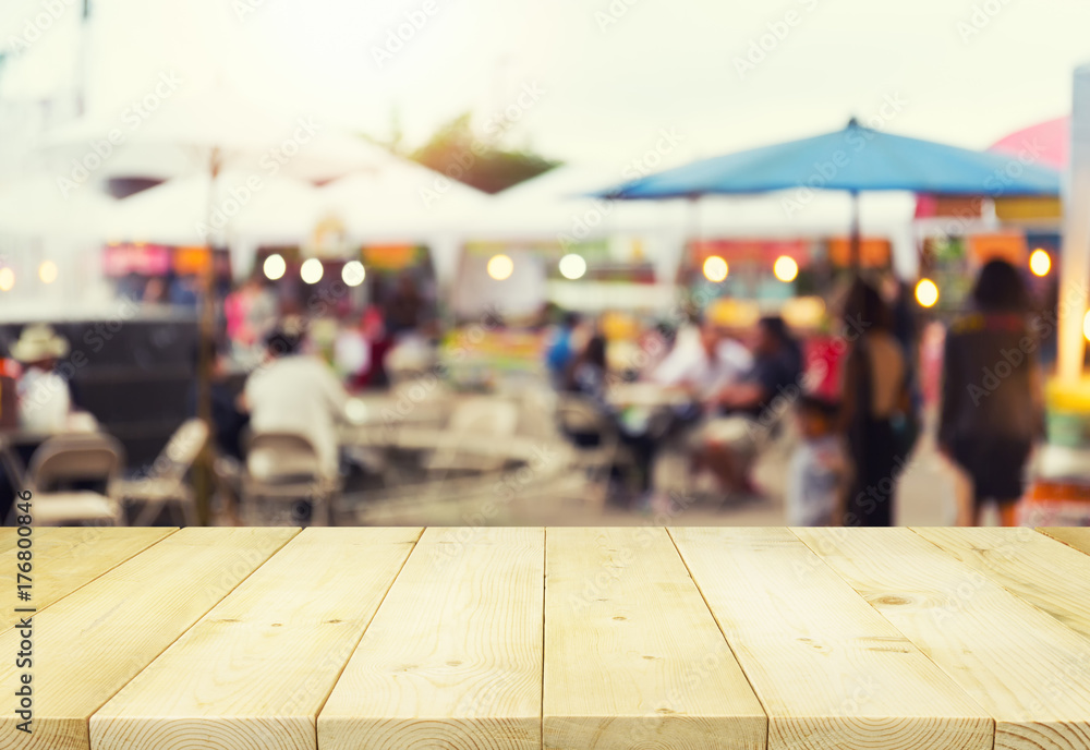 Blurred image of food fairs and food festivals consist of many booth ...