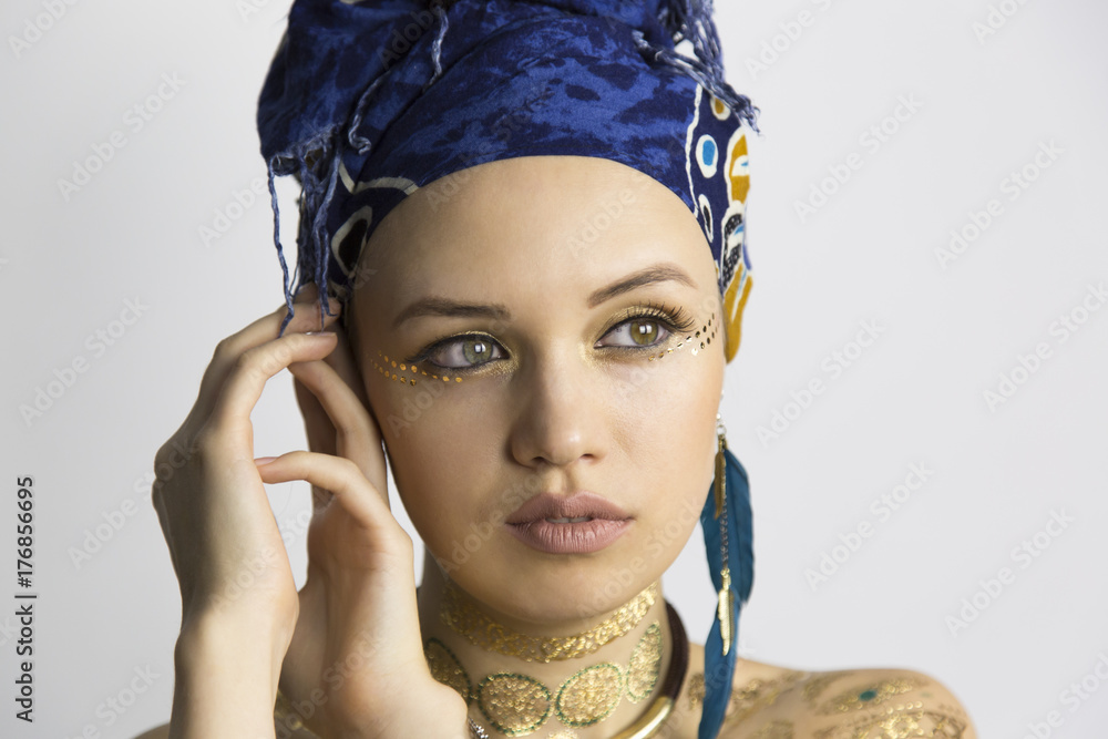 Oriental girl in African clothes Arab girl in an African style dress ...