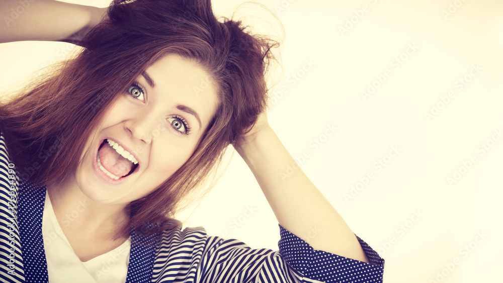 Woman having shocked amazed face expression Stock Photo | Adobe Stock