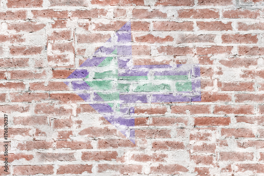 Arrow indicating the direction on a pink brick wall Stock Photo | Adobe ...